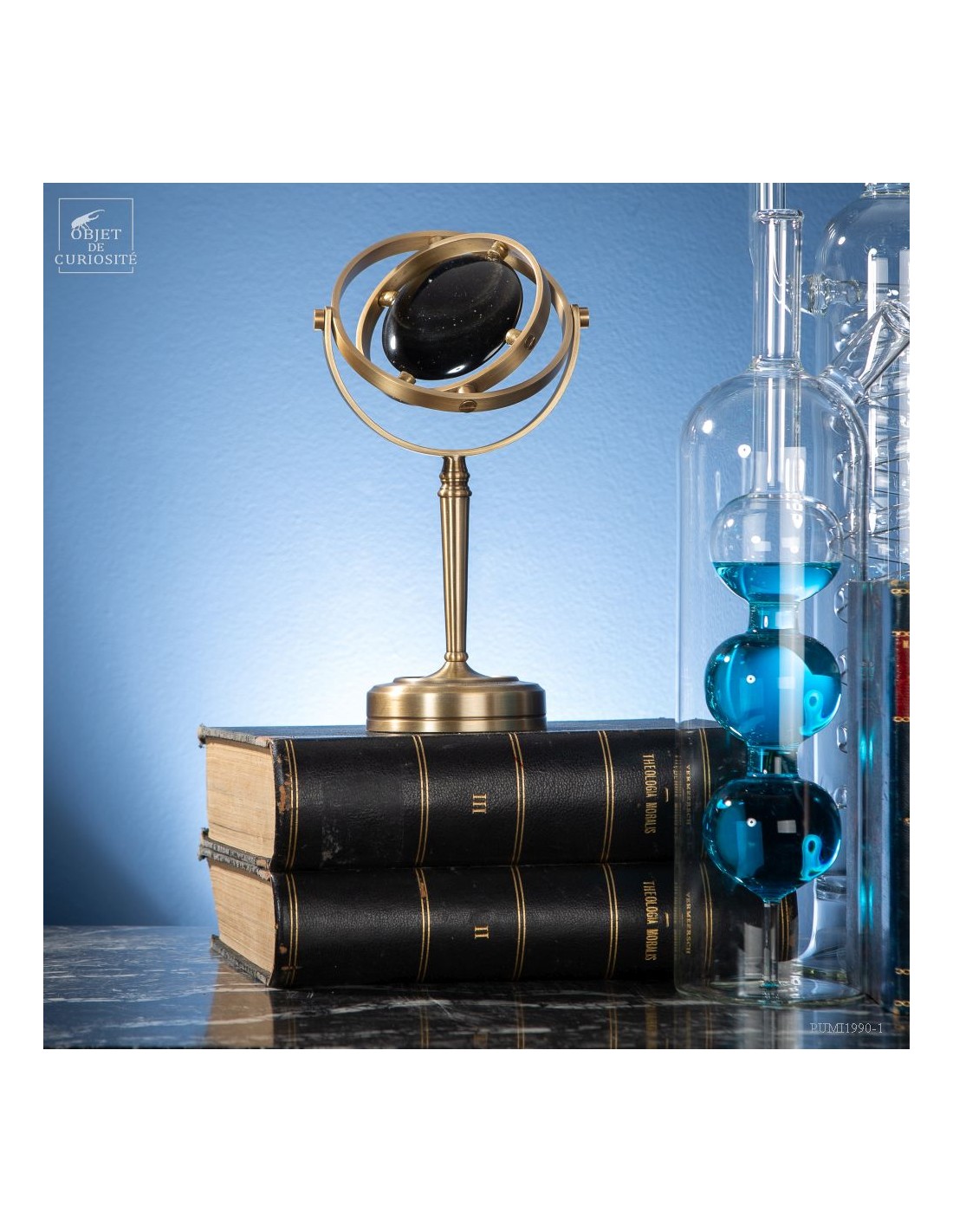 Golden Obsidian disc in spinning brass stand