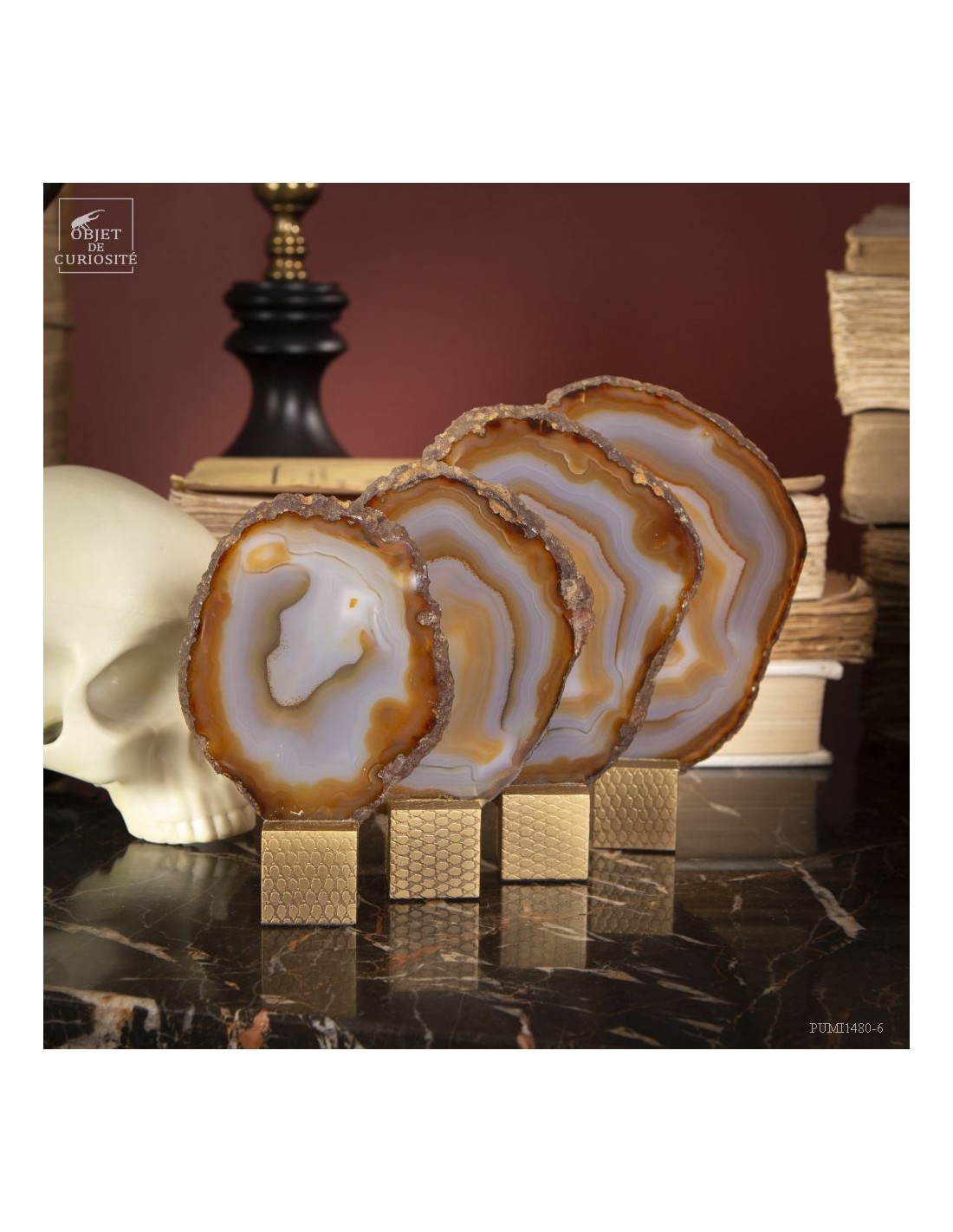 Serie of 4 agate slices on brass cubic stand